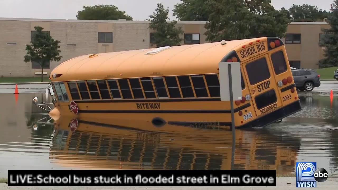 Watch: Wisconsin School Bus Stranded in Flood Water - School ...